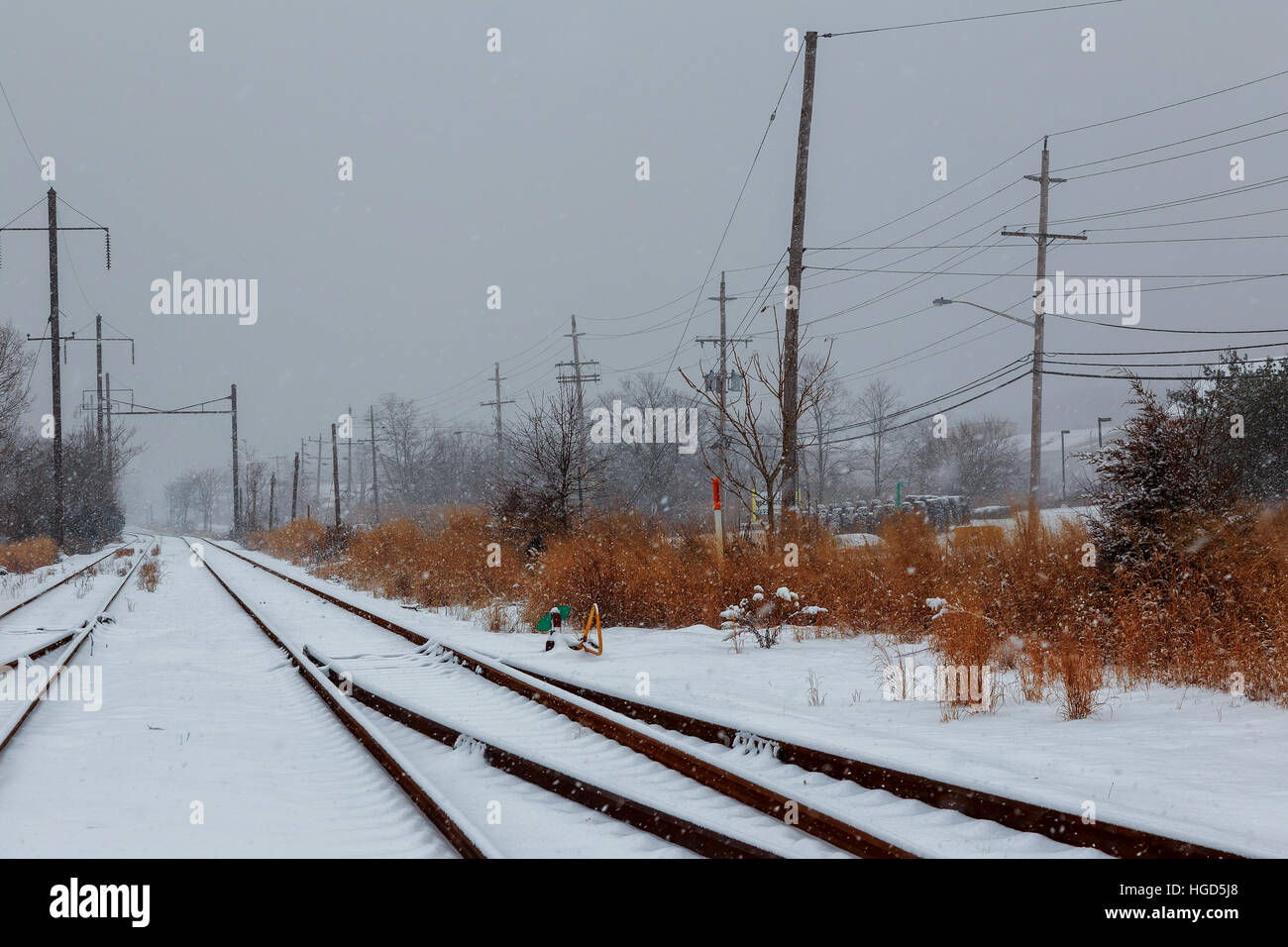 Snow covered railway crossing Railway covered with snow Stock Photo - Alamy