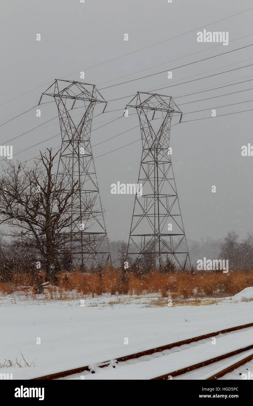 Power lines in winter scenery, electrical tower in wintertime with snow ...