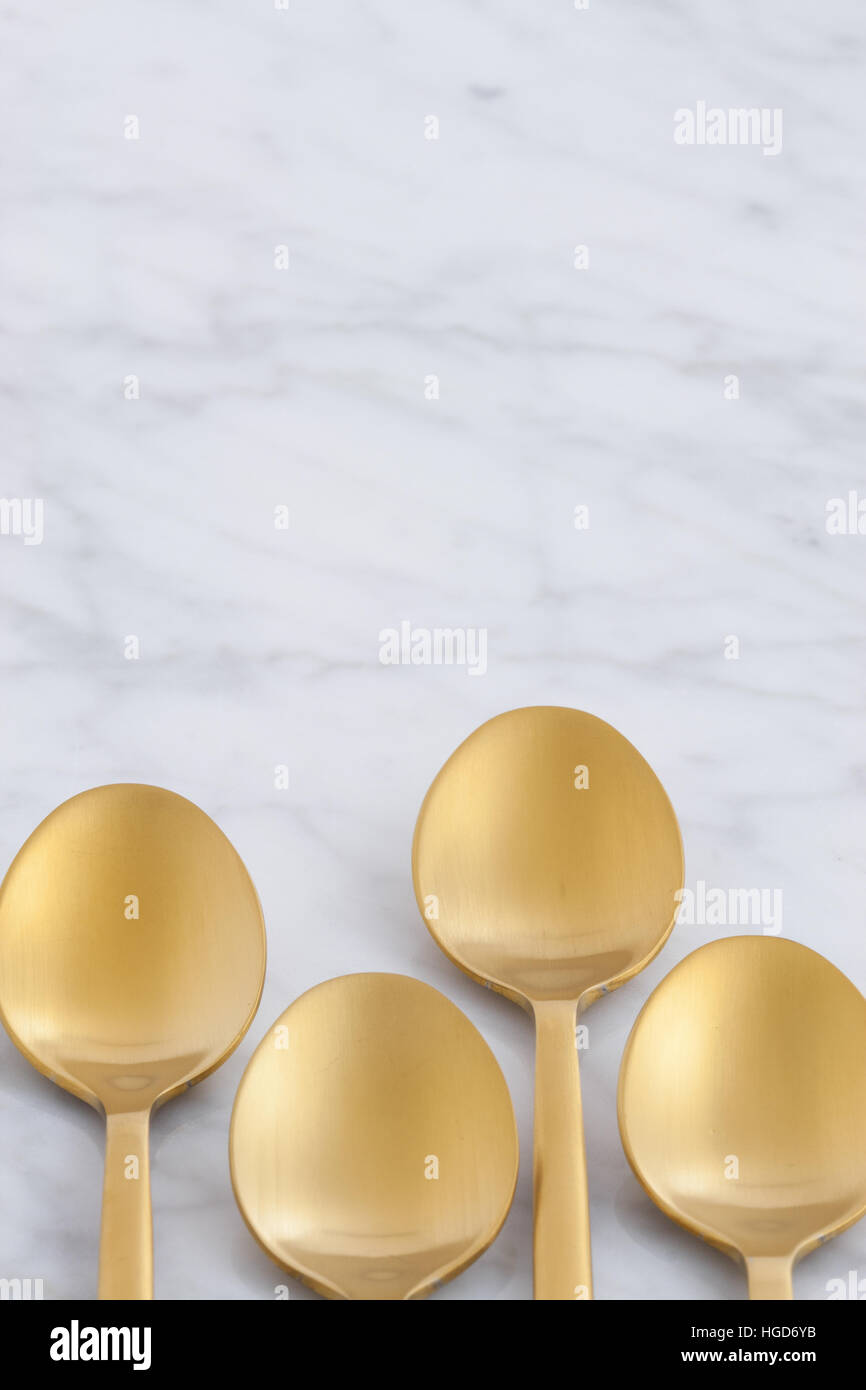 Golden spoon set hi-res stock photography and images - Alamy