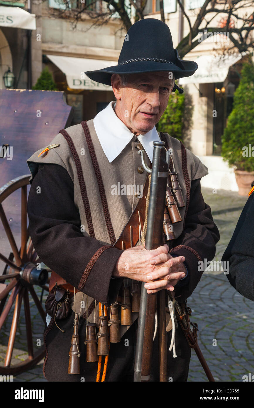 Man dressed in period costume for Escalade and holding his musket and ...