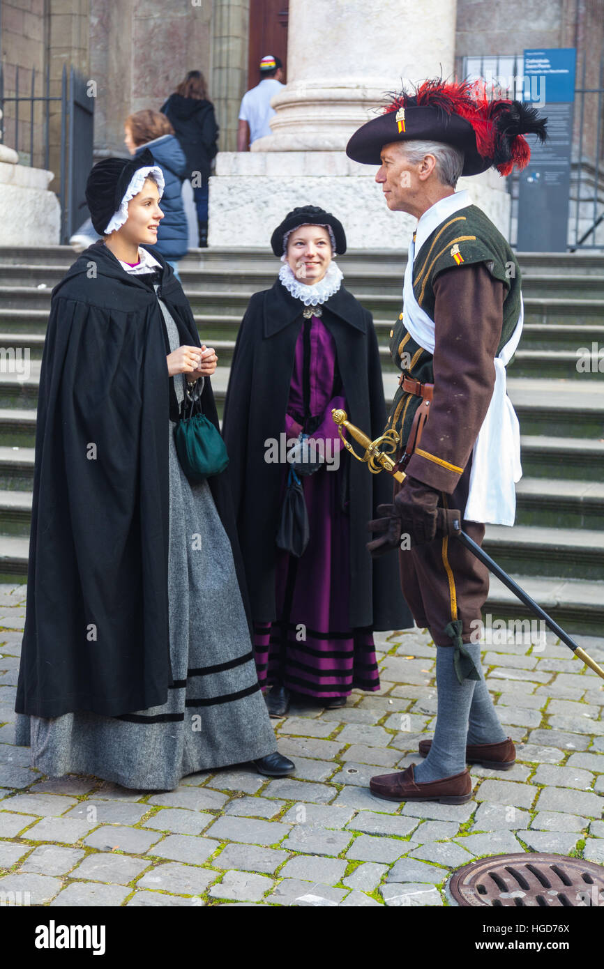Man with two young women dressed in period costume for Escalade in ...