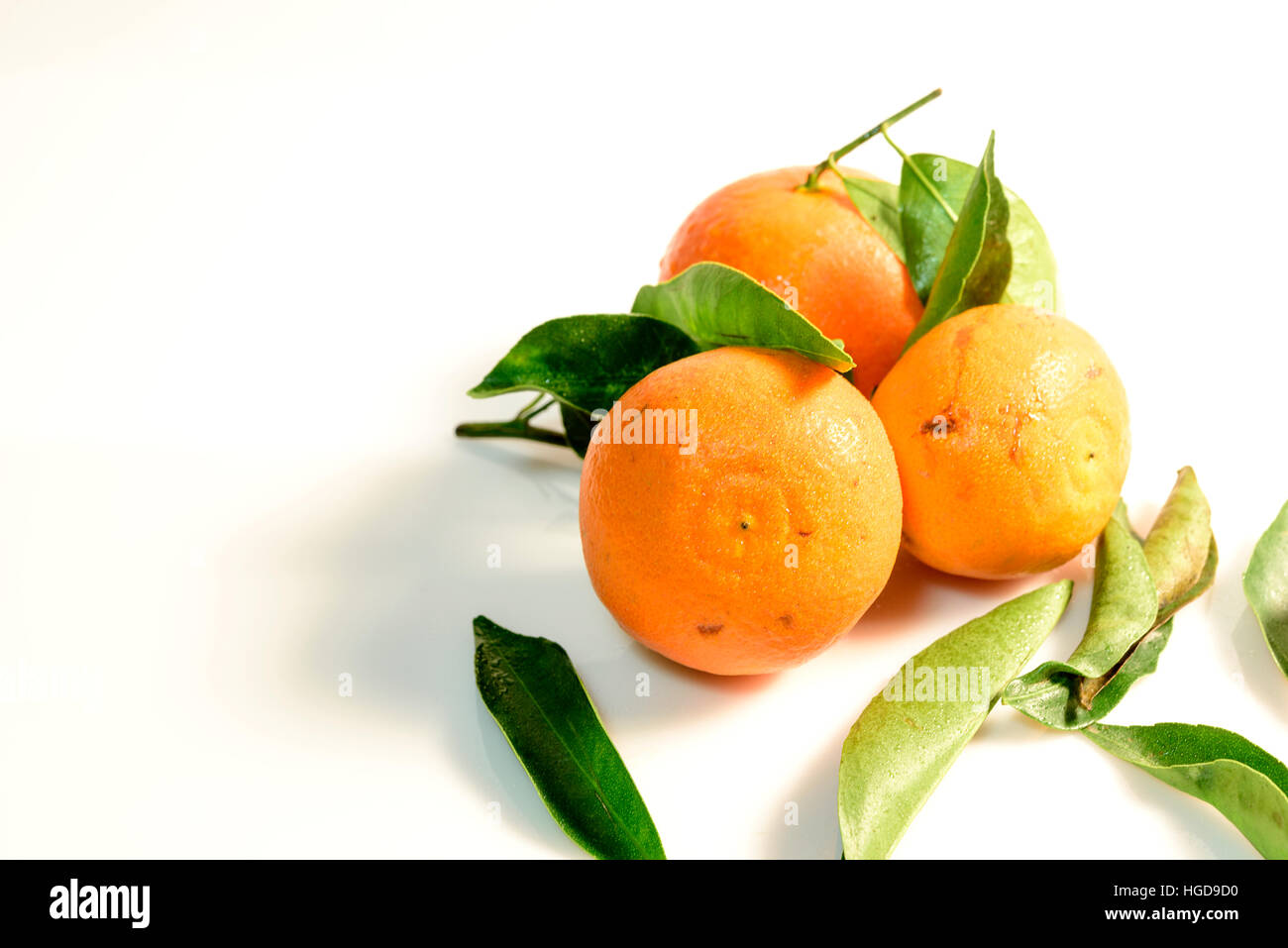 Orange fruit with Leaves Stock Photo - Alamy
