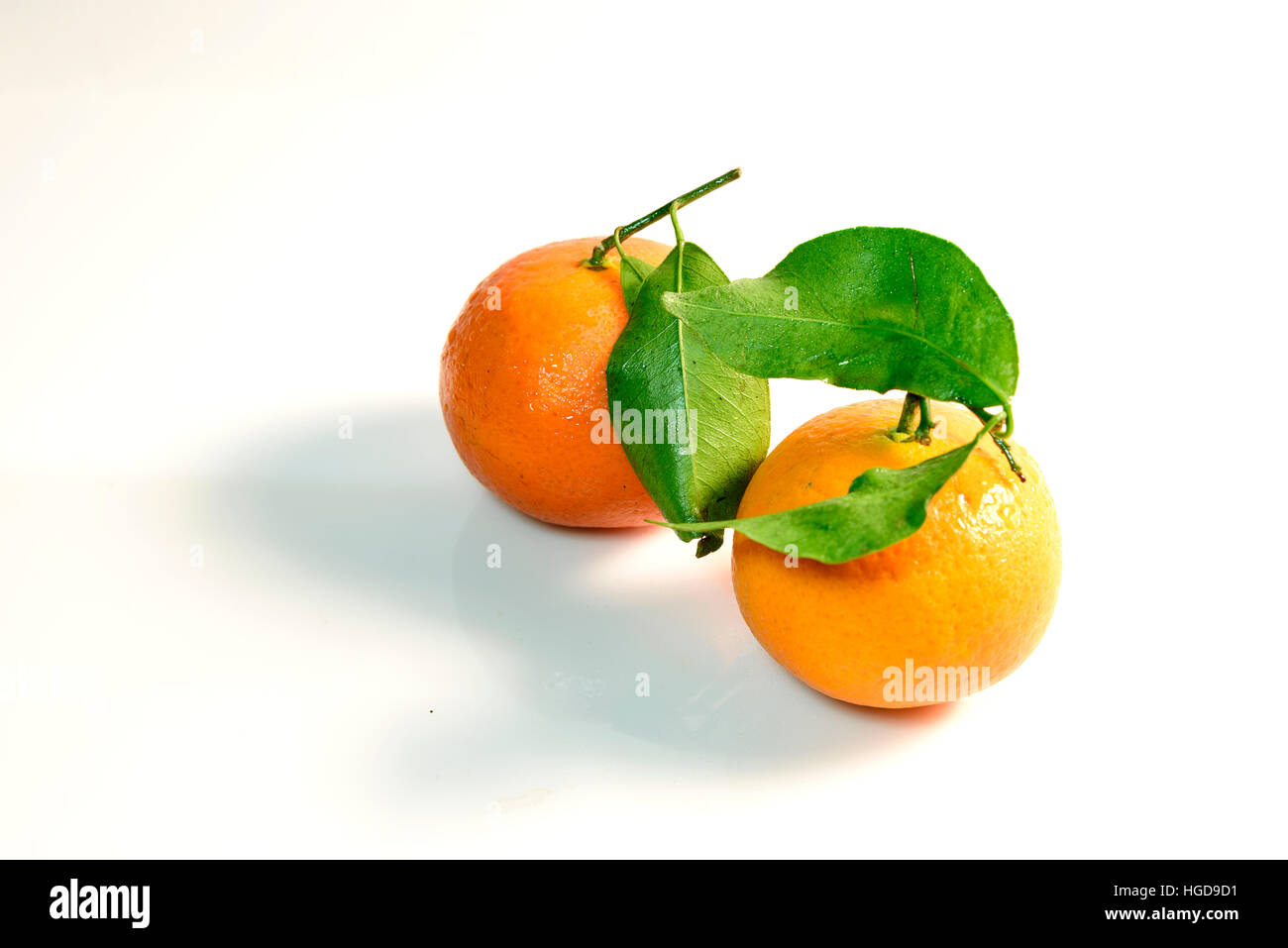 Orange fruit with Leaves Stock Photo - Alamy