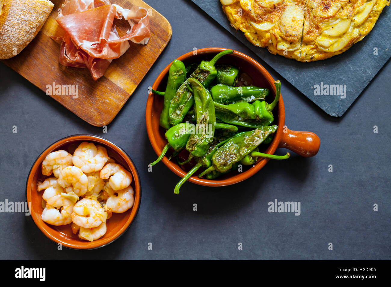 Authentic Spanish tapas with padron peppers, garlic prawns and ...
