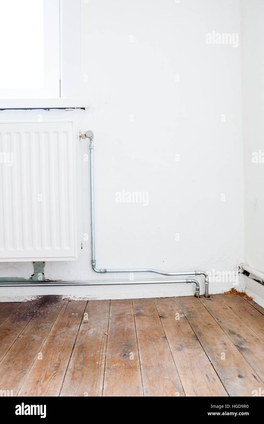 supply to the radiator in the bathroom close up Stock Photo - Alamy