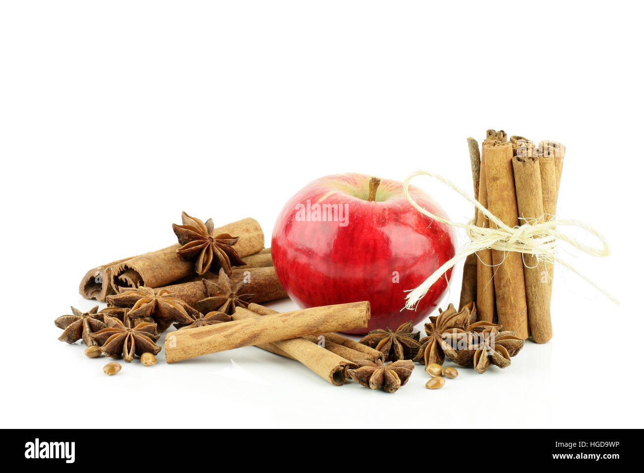 A shiny fresh red Elstar apple (Malus domestica) with cinnamon and star ...