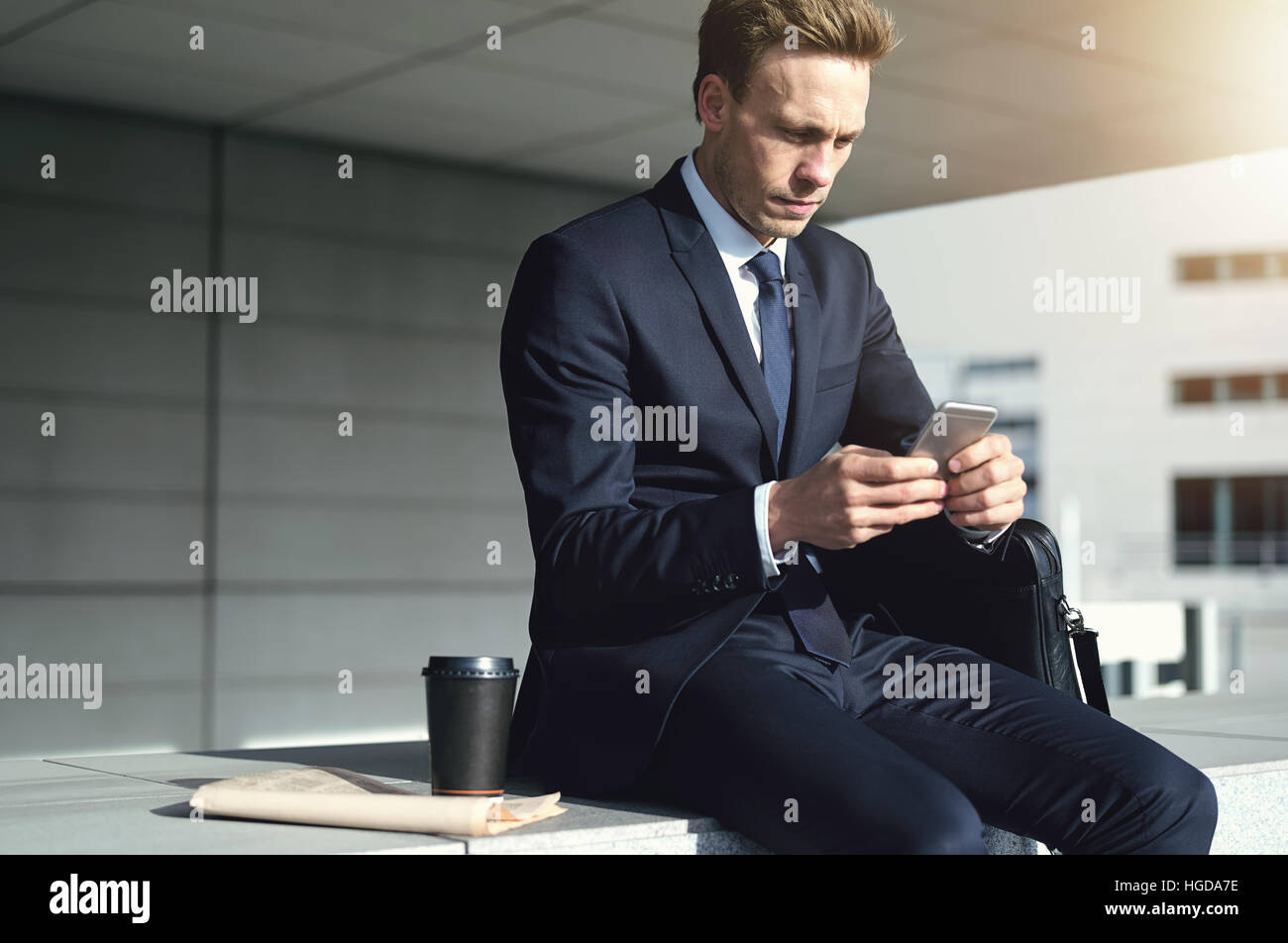 Young man uses smartphone hi-res stock photography and images - Alamy