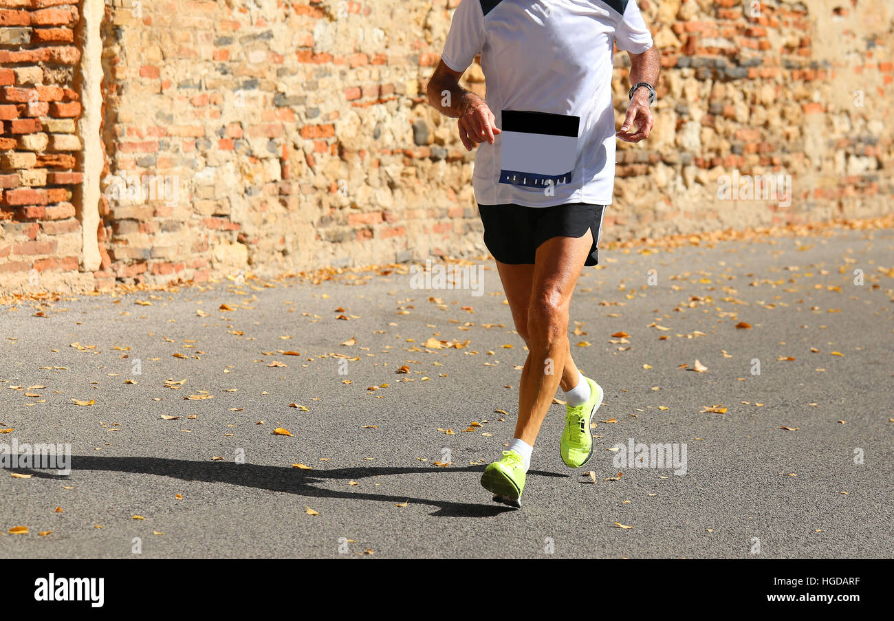 Elderly marathon runner hi-res stock photography and images - Alamy