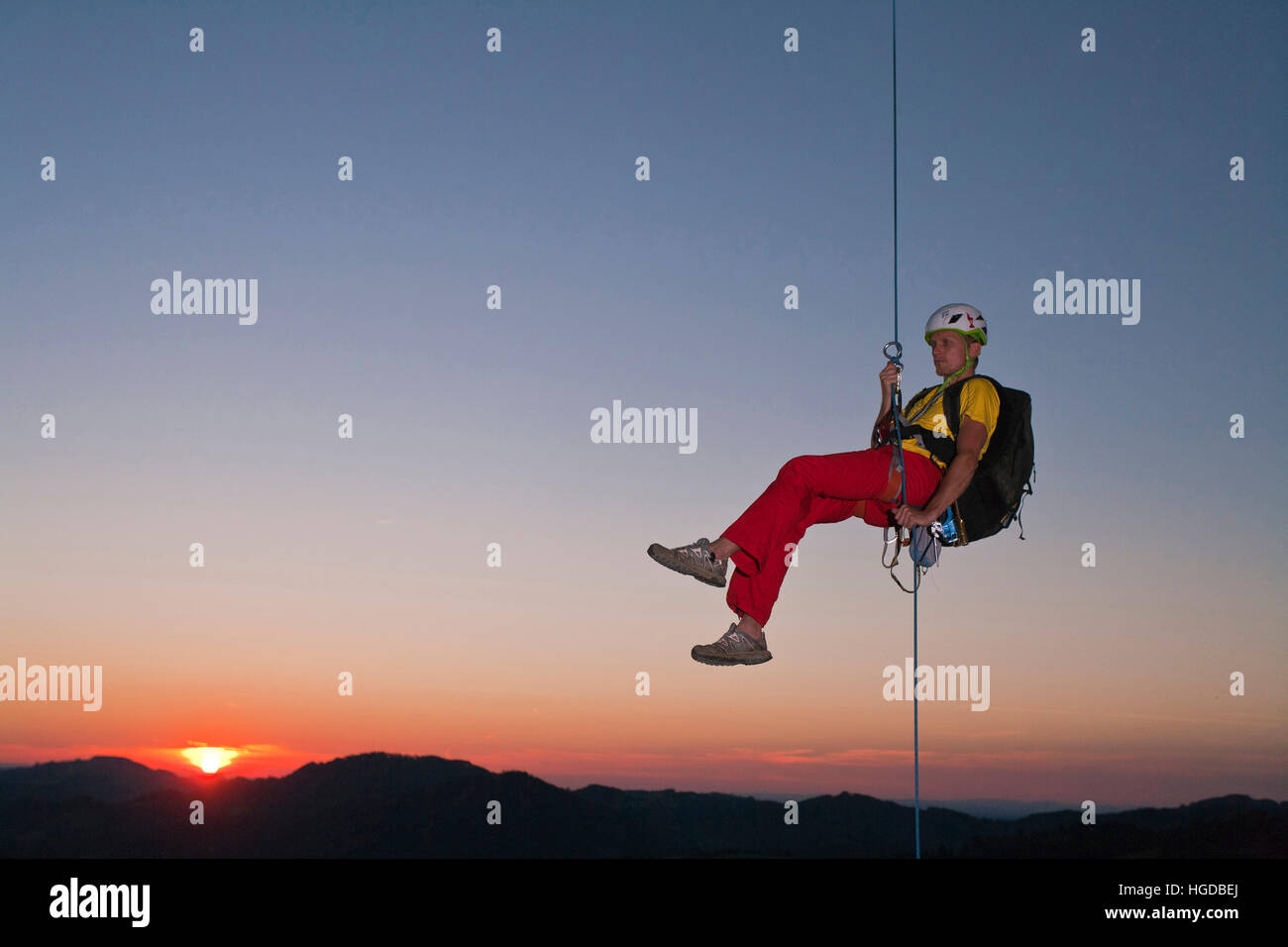 man rappeling in the Austrian alps Stock Photo - Alamy