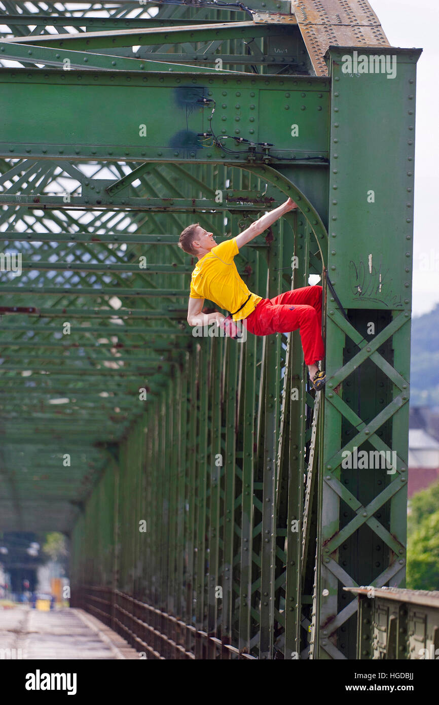 urban climbing on a bridge Stock Photo - Alamy