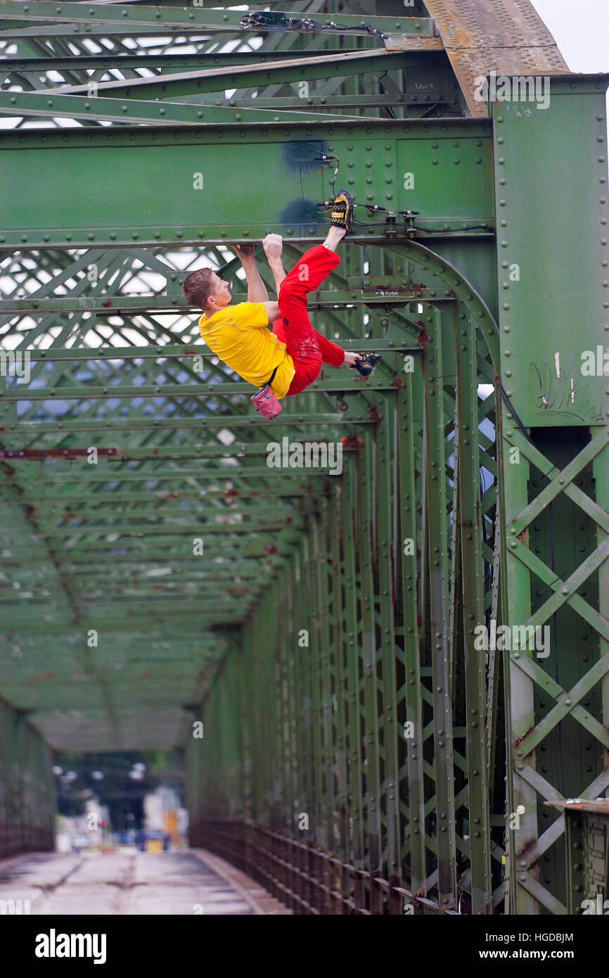 urban climbing on a bridge Stock Photo - Alamy