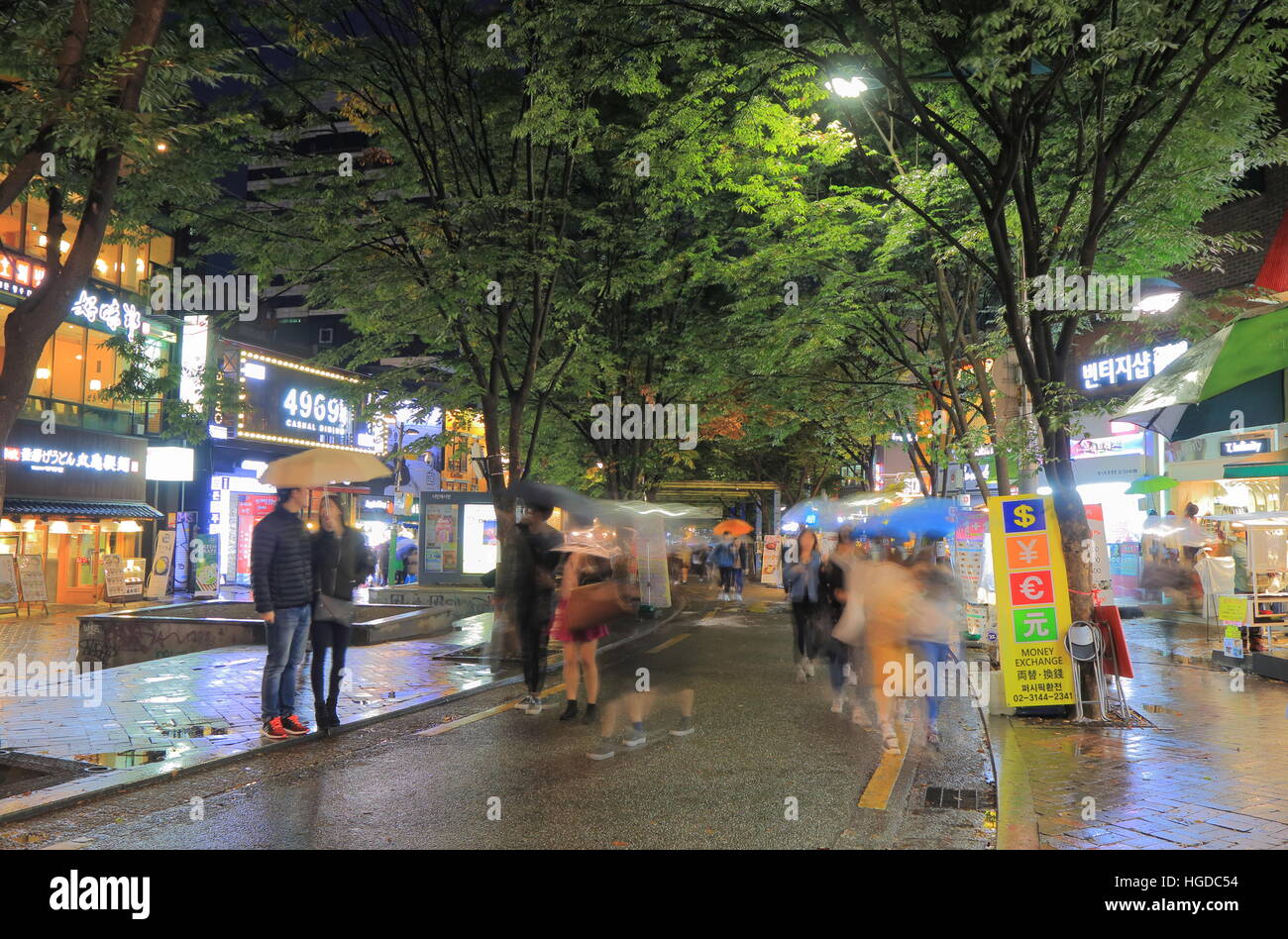People visit Hongdae shopping street in Seoul South Korea. Hongdae is ...
