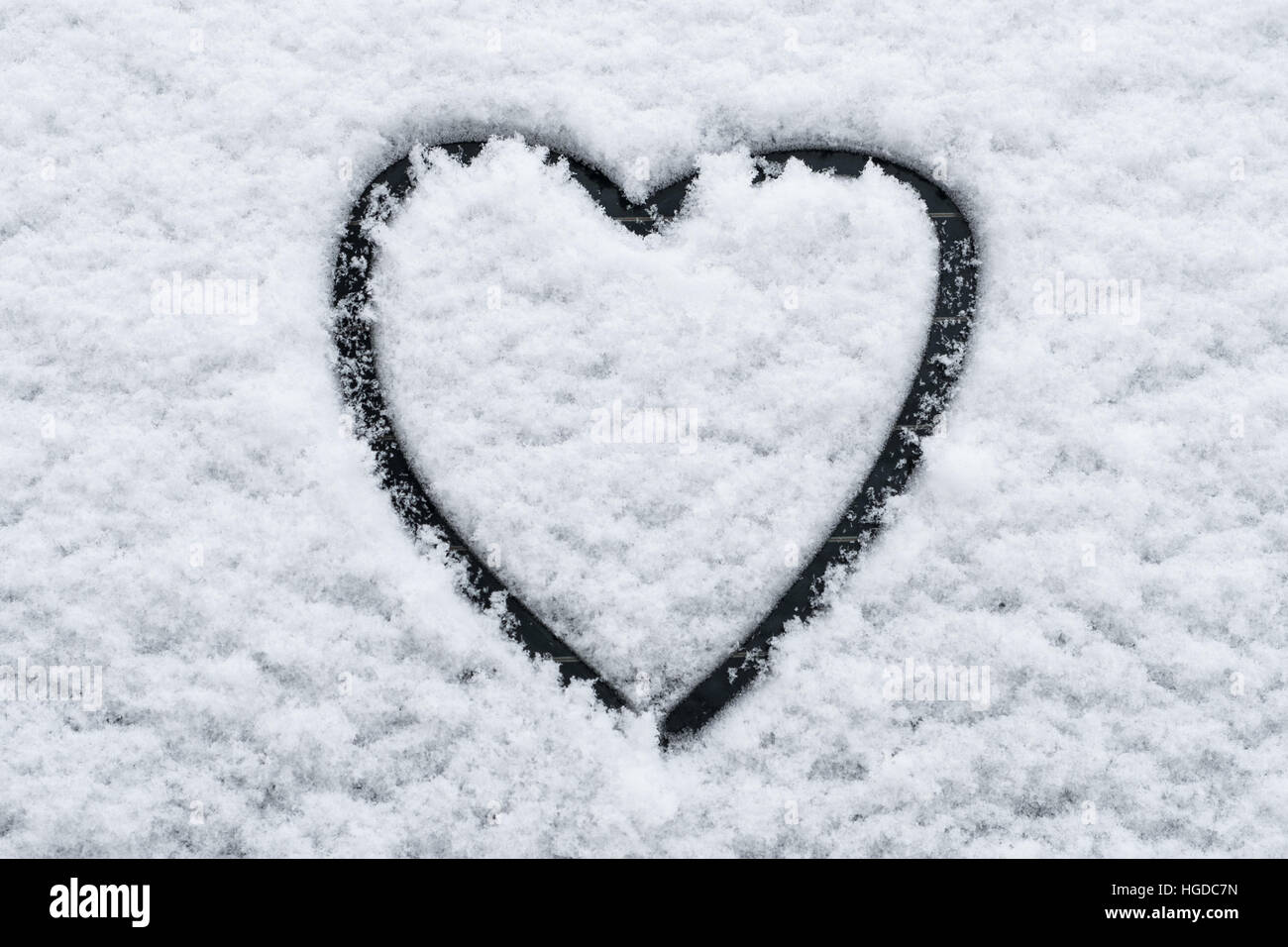 heart shape in snow on car window Stock Photo - Alamy