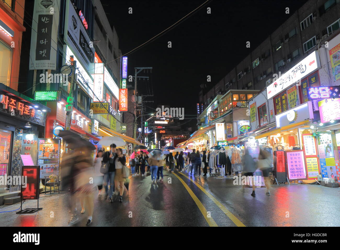 People visit Hongdae shopping street in Seoul South Korea. Hongdae is ...