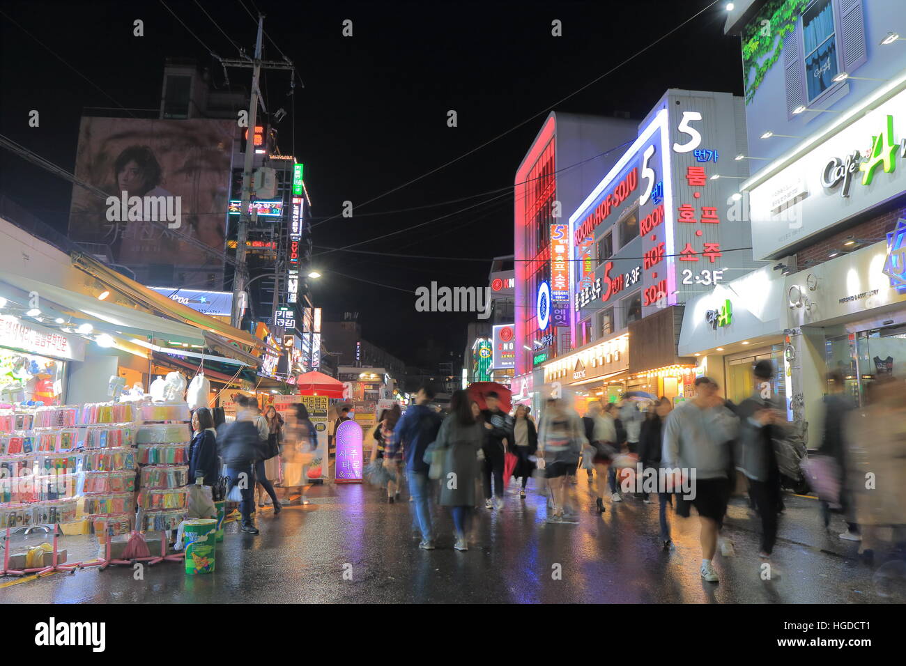 People visit Hongdae shopping street in Seoul South Korea. Hongdae is ...