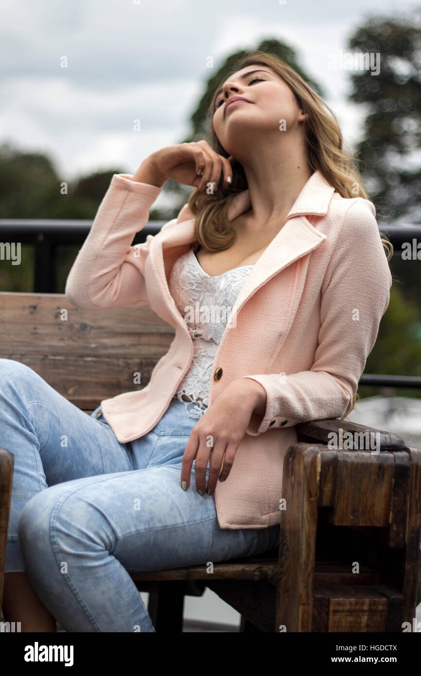 Woman relaxing and breathing fresh air Stock Photo - Alamy