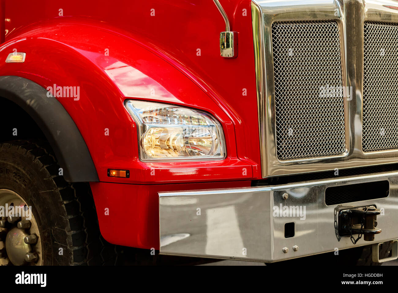 Front end of a semi truck while parked red truck Stock Photo - Alamy