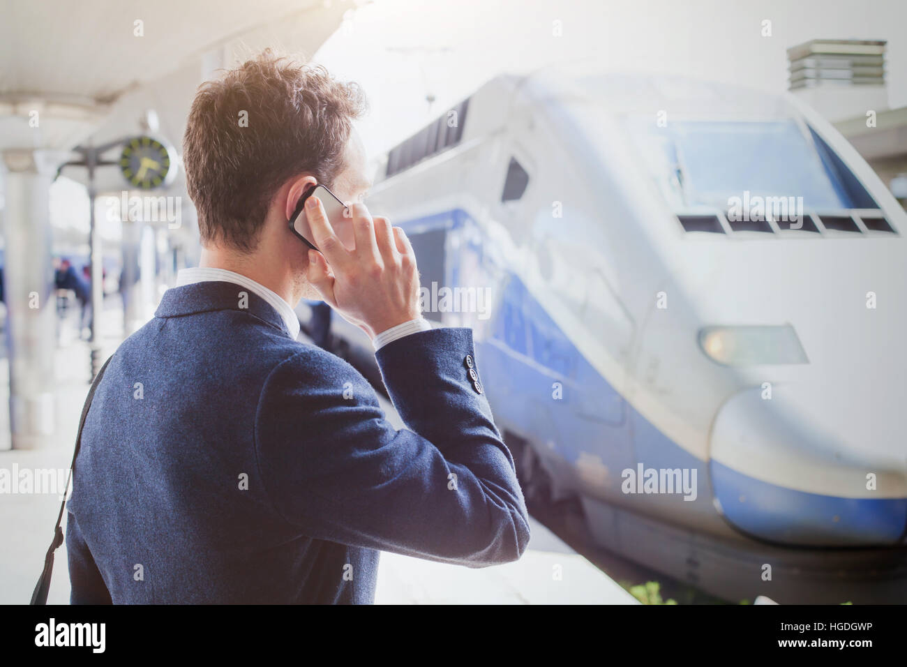 Person with mobile busy railway station hi-res stock photography and ...