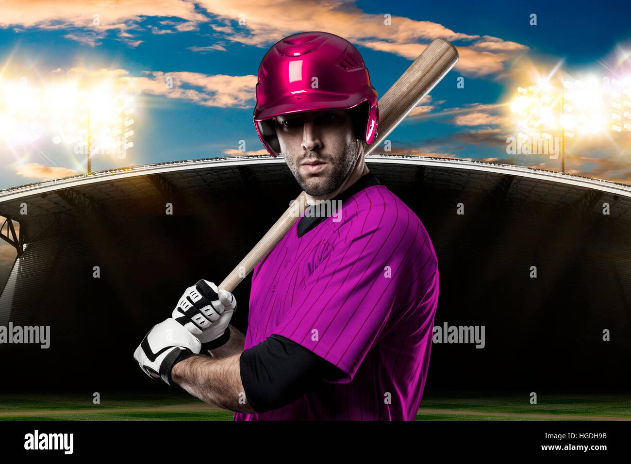 Baseball Player with a pink uniform on baseball Stadium Stock Photo - Alamy