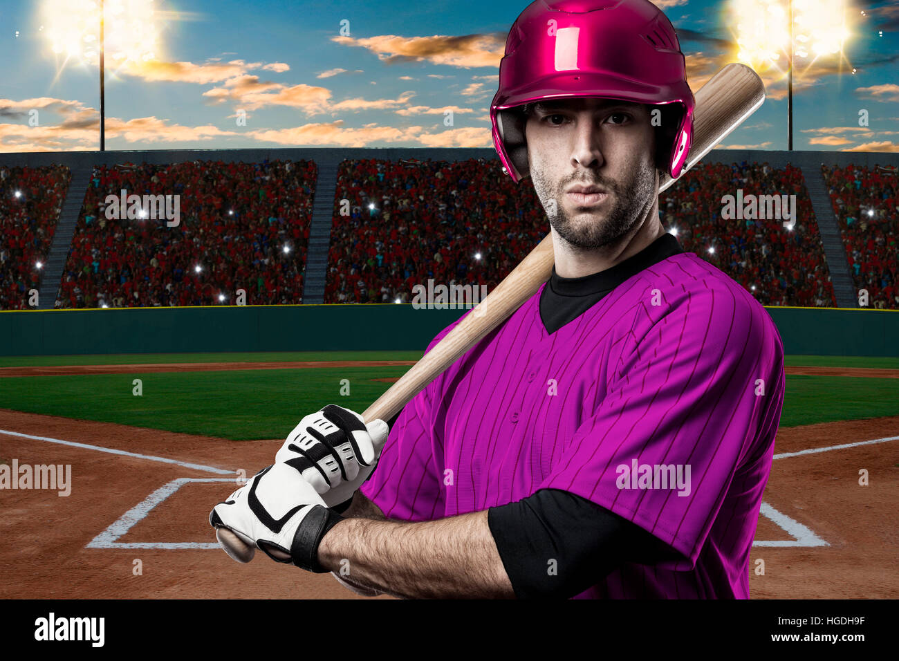 Baseball Player with a pink uniform on baseball Stadium Stock Photo - Alamy