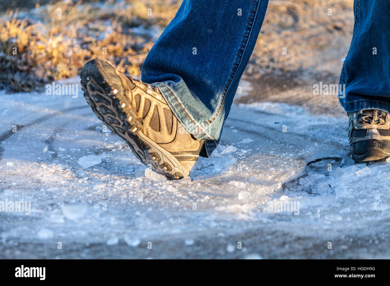 human goes on a dangerous ice area Stock Photo - Alamy