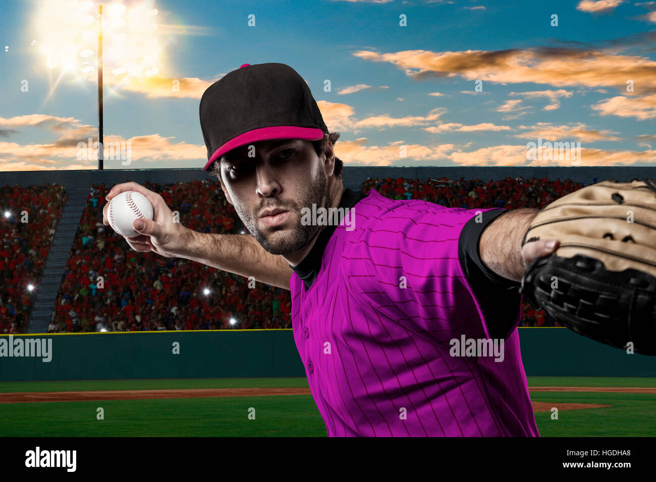 Baseball Player with a pink uniform on baseball Stadium Stock Photo - Alamy