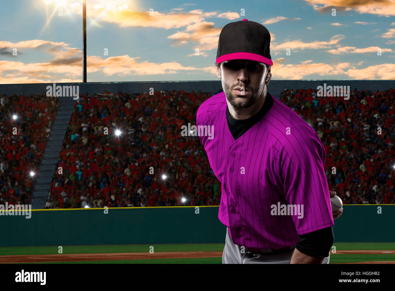 Pitcher Baseball Player with a pink uniform on baseball Stadium Stock ...