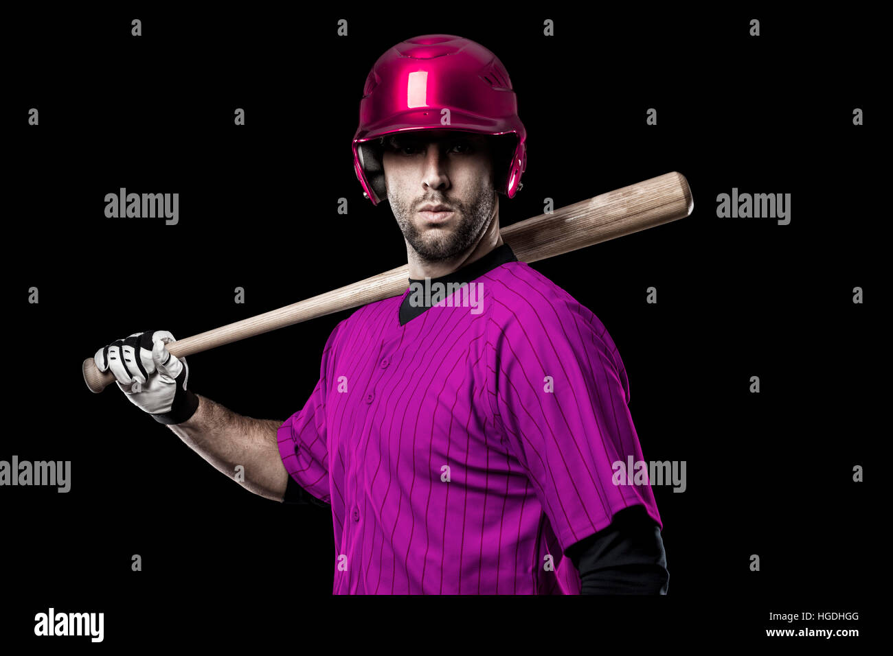 Baseball Player with a pink uniform on a black background Stock Photo ...