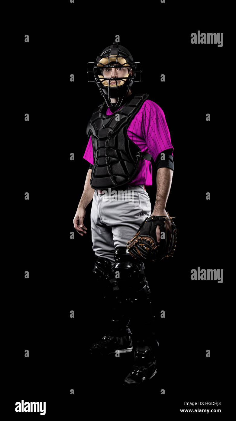 Catcher Baseball Player with a pink uniform on a black background Stock ...