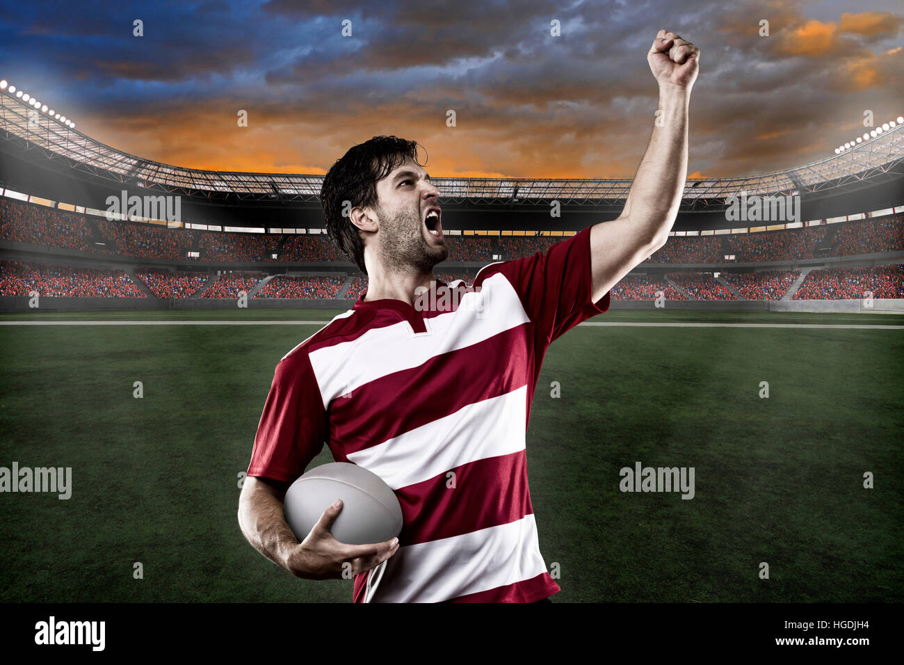 Rugby player in a red uniform celebrating. White Background Stock Photo ...