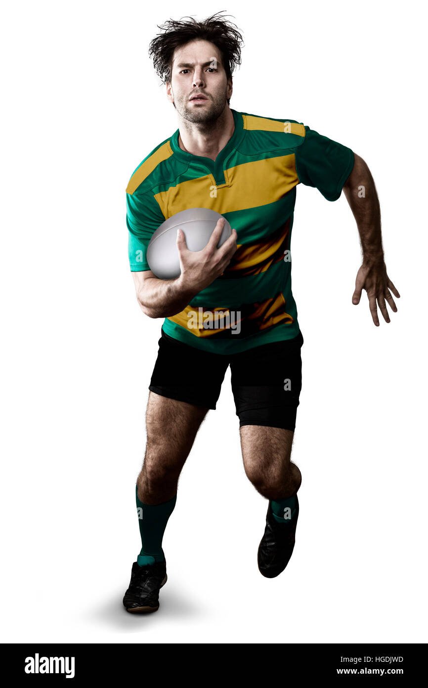 Rugby player in a green and gold uniform running. White Background ...