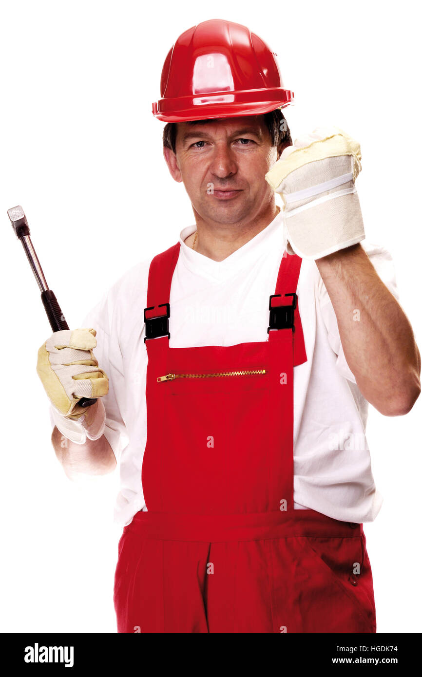 Mechanic wearing red overall and red construction helmet Stock Photo ...