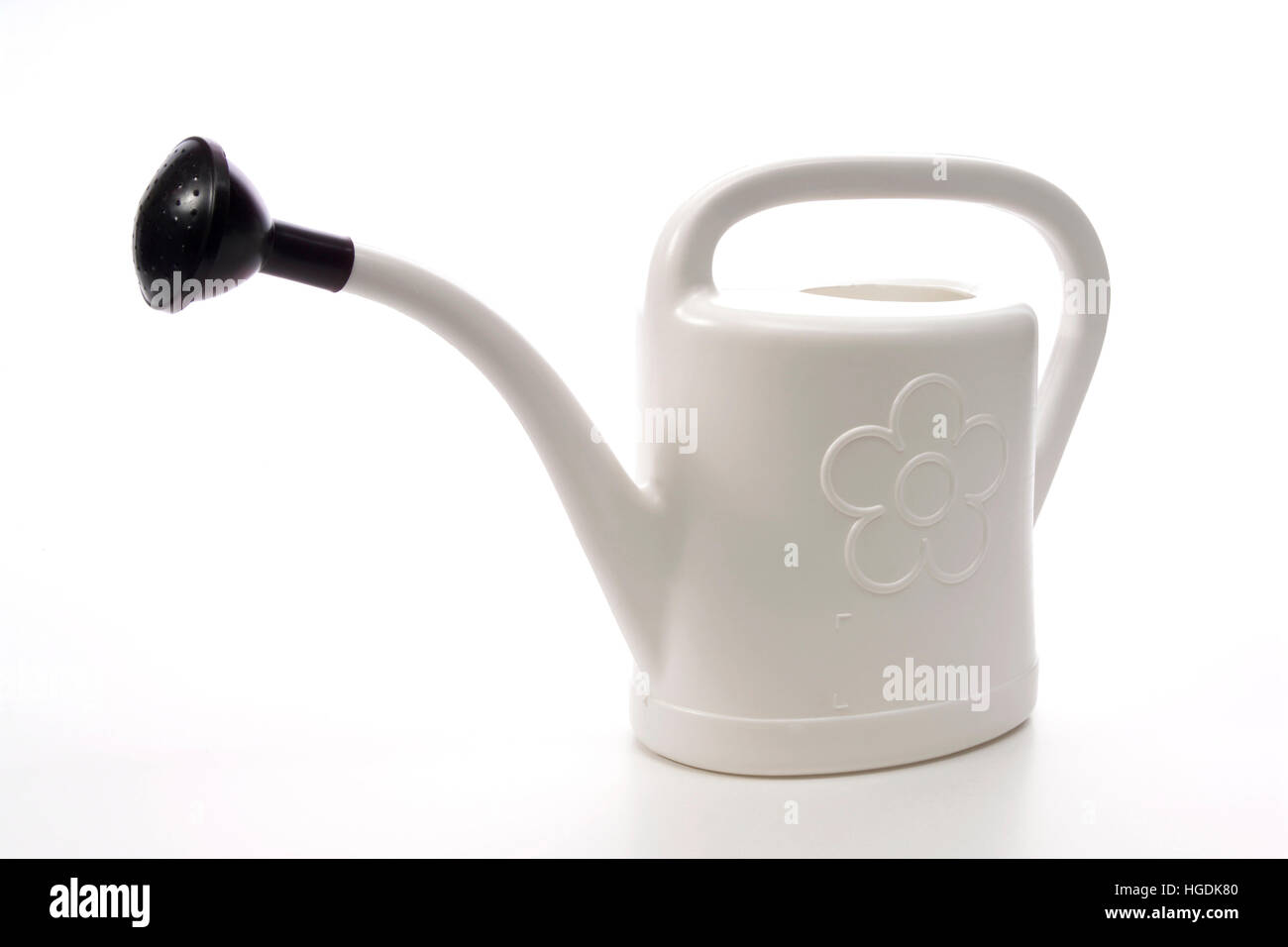 White watering can Stock Photo - Alamy