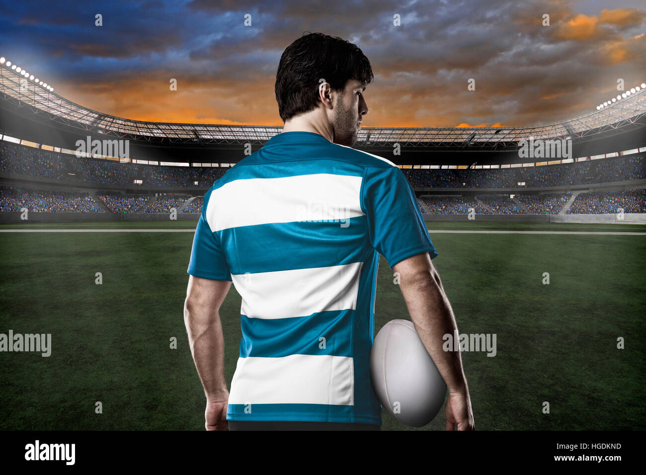 Rugby player in a blue uniform on a stadium Stock Photo - Alamy