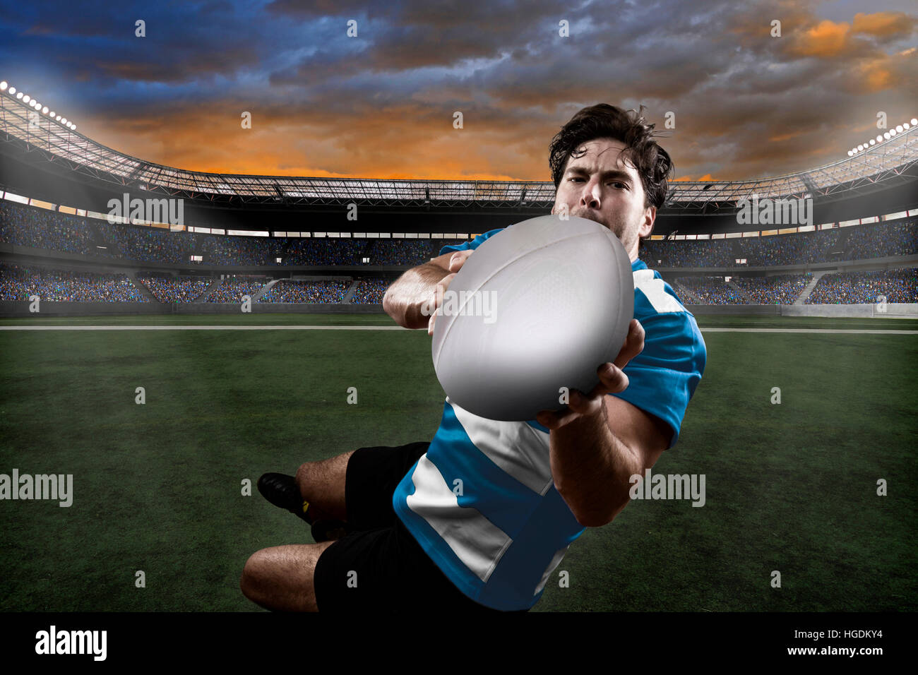 Rugby player in a blue uniform on a stadium Stock Photo - Alamy