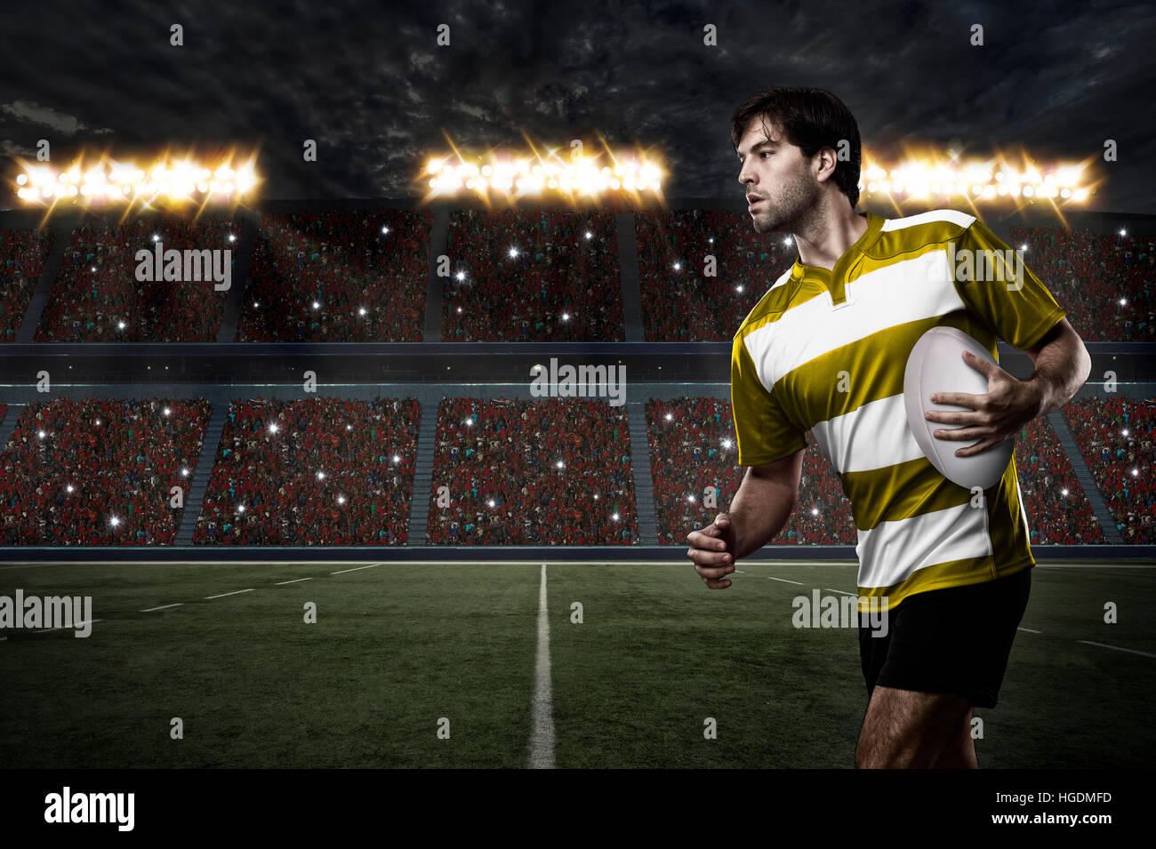 Rugby player in yellow uniform hi-res stock photography and images - Alamy