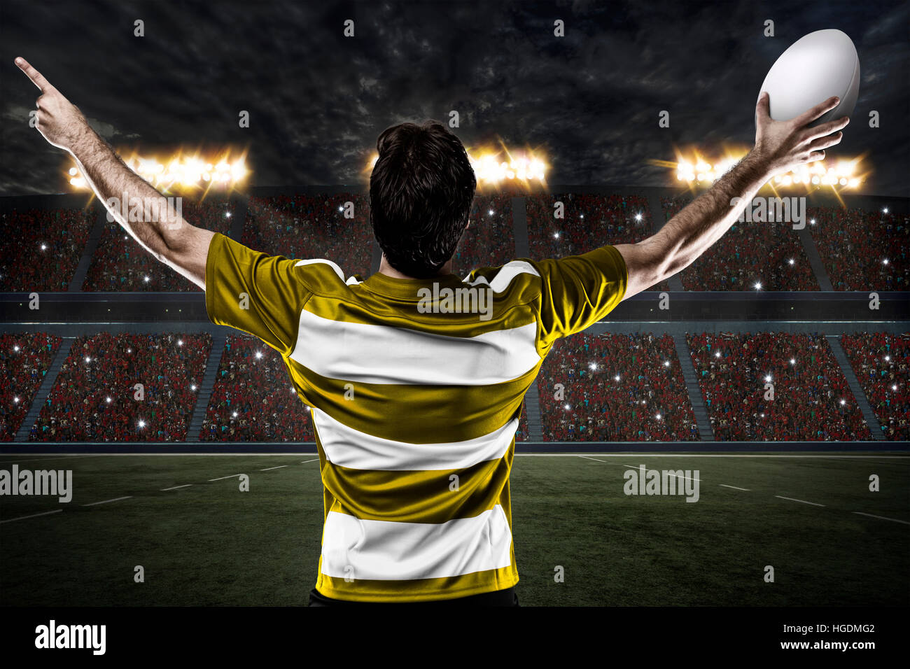 Rugby player in yellow uniform hi-res stock photography and images - Alamy