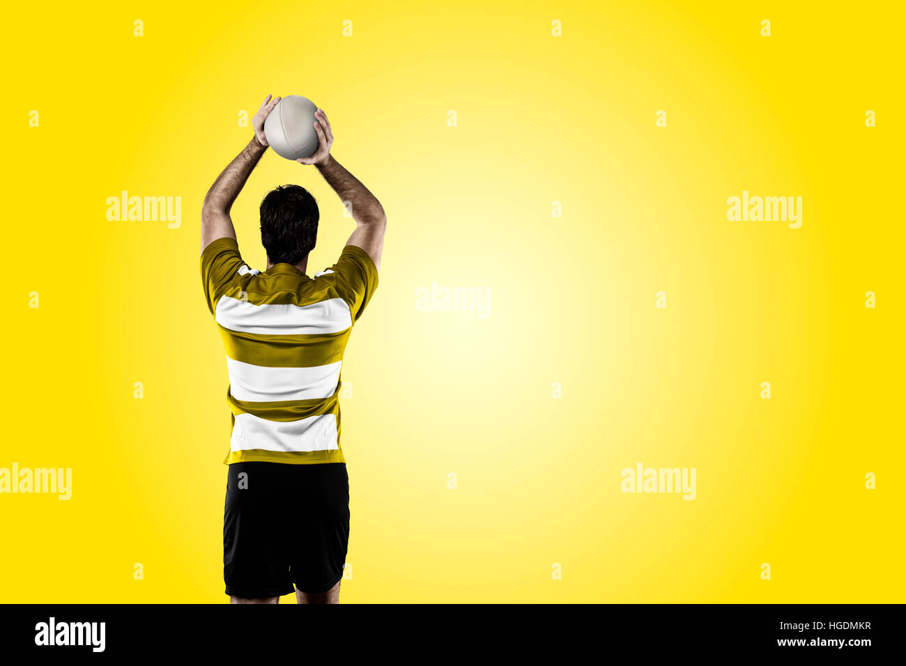 Rugby player in yellow uniform hi-res stock photography and images - Alamy