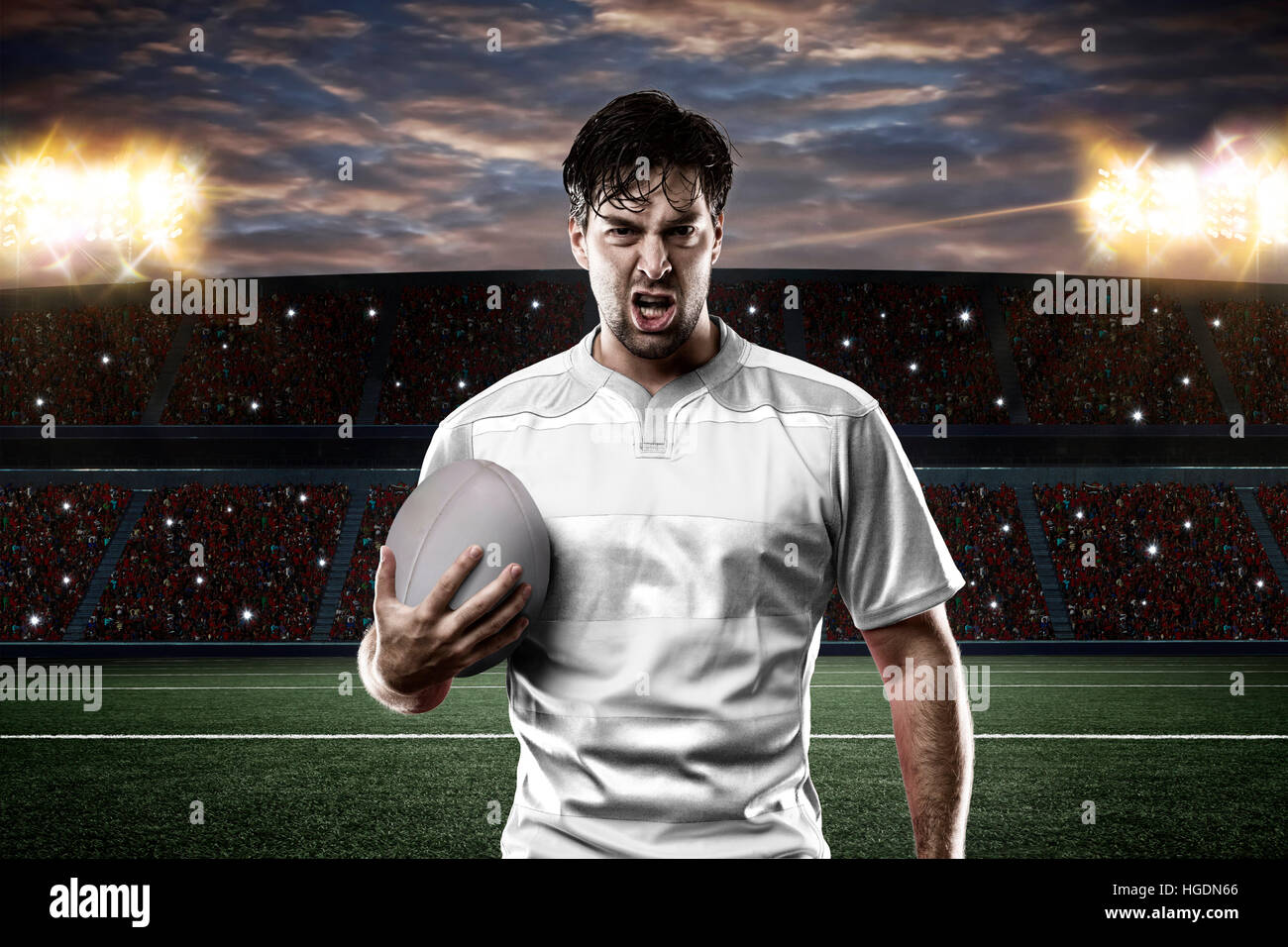 Rugby player in a white uniform on a stadium Stock Photo - Alamy