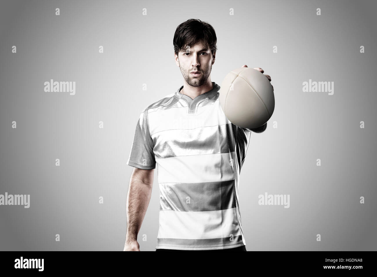 Rugby player in a white uniform on a white background Stock Photo - Alamy