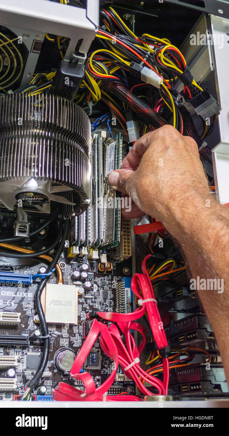 Installing RAM memory stick custom desktop computer Stock Photo - Alamy