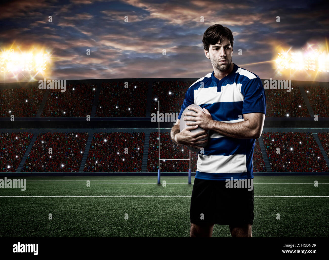 Rugby player in a blue uniform on a stadium Stock Photo - Alamy