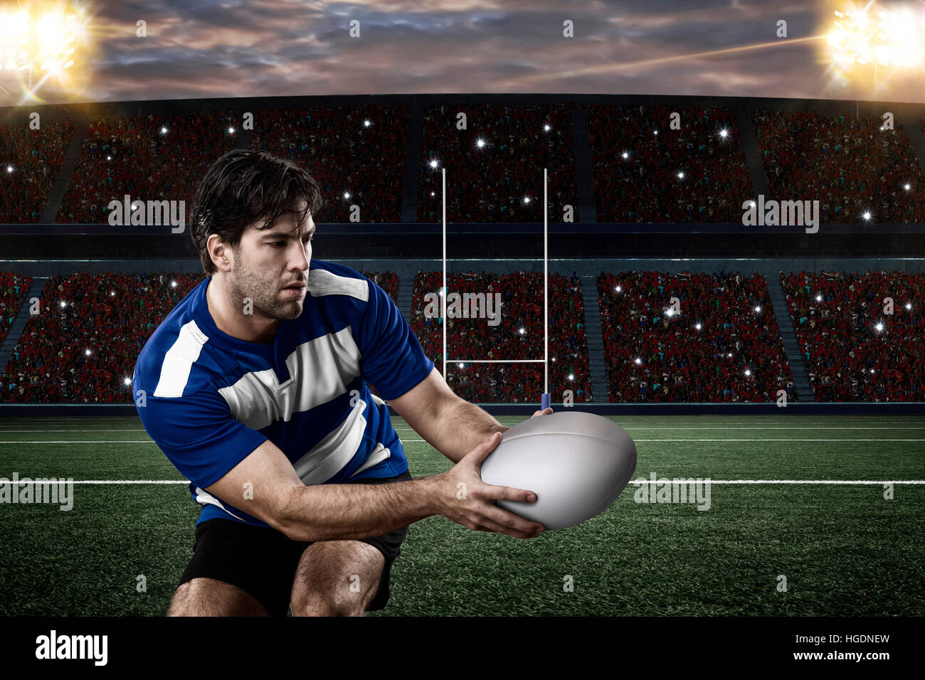 Rugby player in a blue uniform on a stadium Stock Photo - Alamy