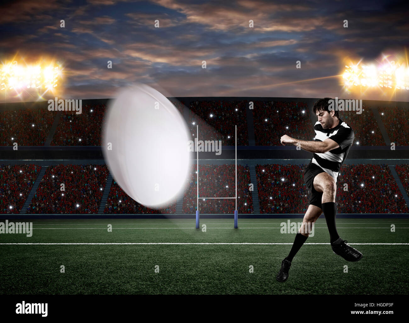 Man Kicking A Rugby Ball High Resolution Stock Photography and Images ...