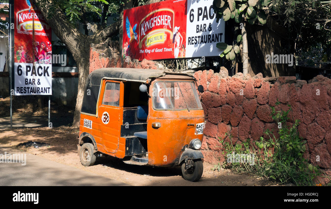 Autorickshaw by Kingfisher beer and bar advertisement Goa India Stock ...