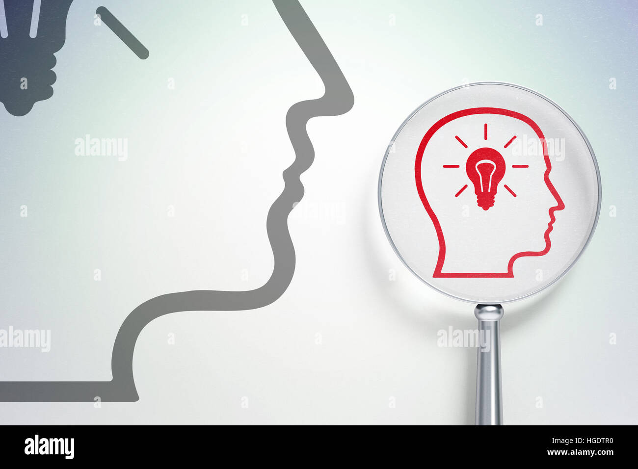 Learning concept: Head With Lightbulb with optical glass on digital ...