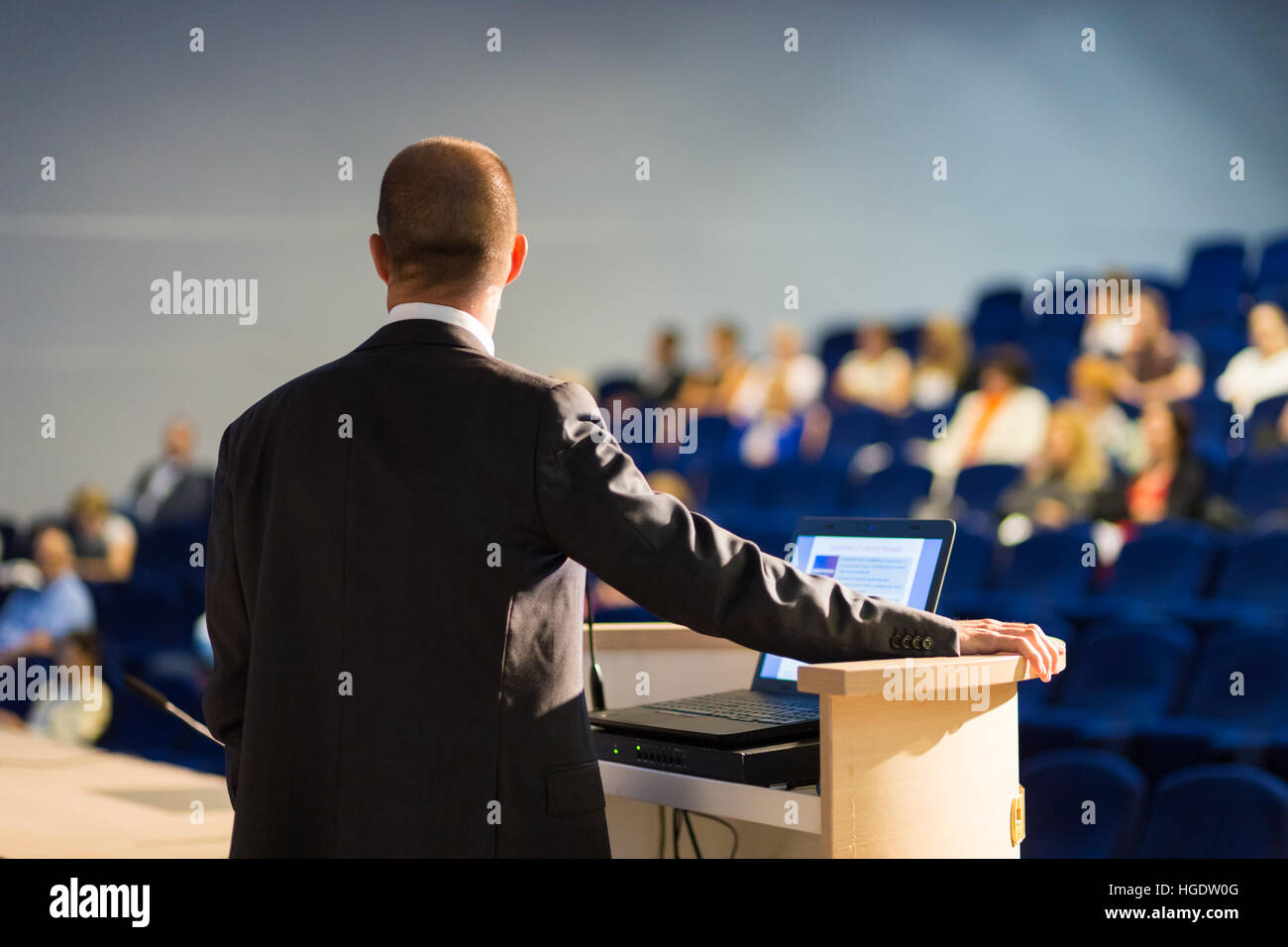 Public speaker giving talk at business event Stock Photo - Alamy