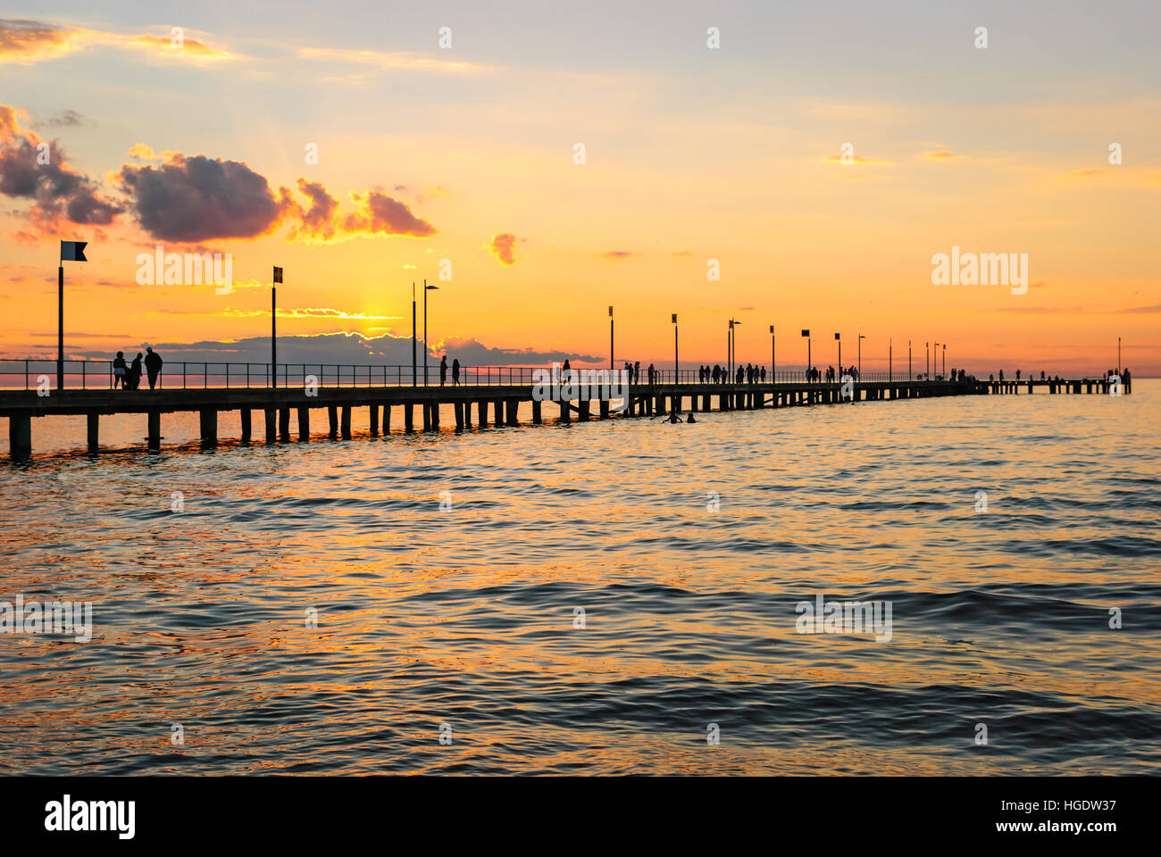 Jetty at sunset Stock Photo - Alamy