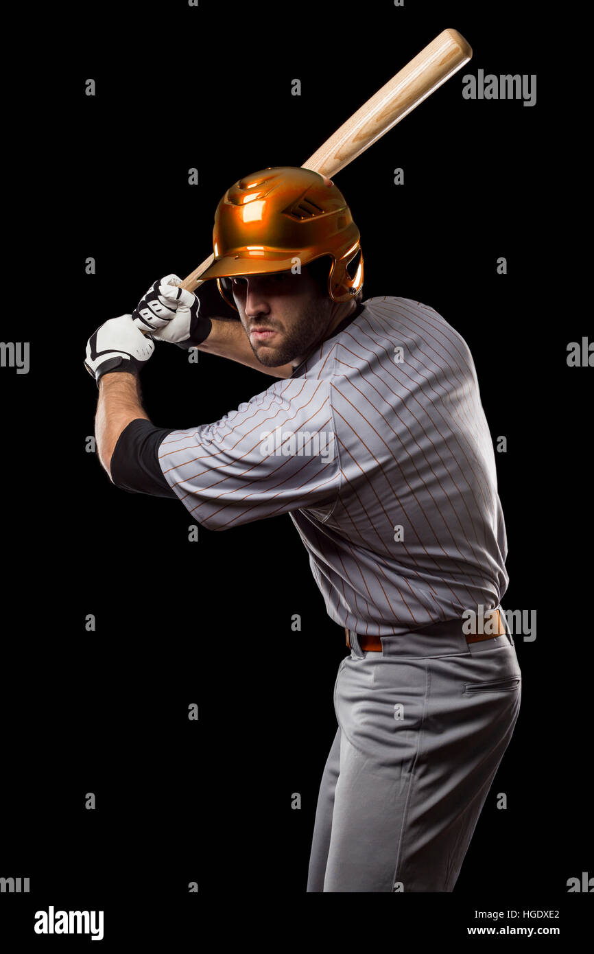 Baseball Player ready to swing, on a black background. Studio Shot ...
