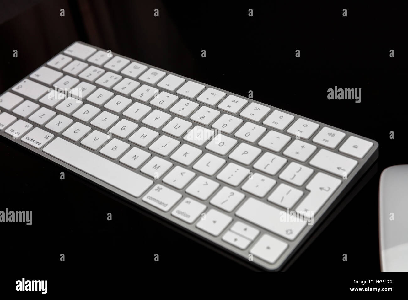 White keyboard and mouse on a black background Stock Photo - Alamy